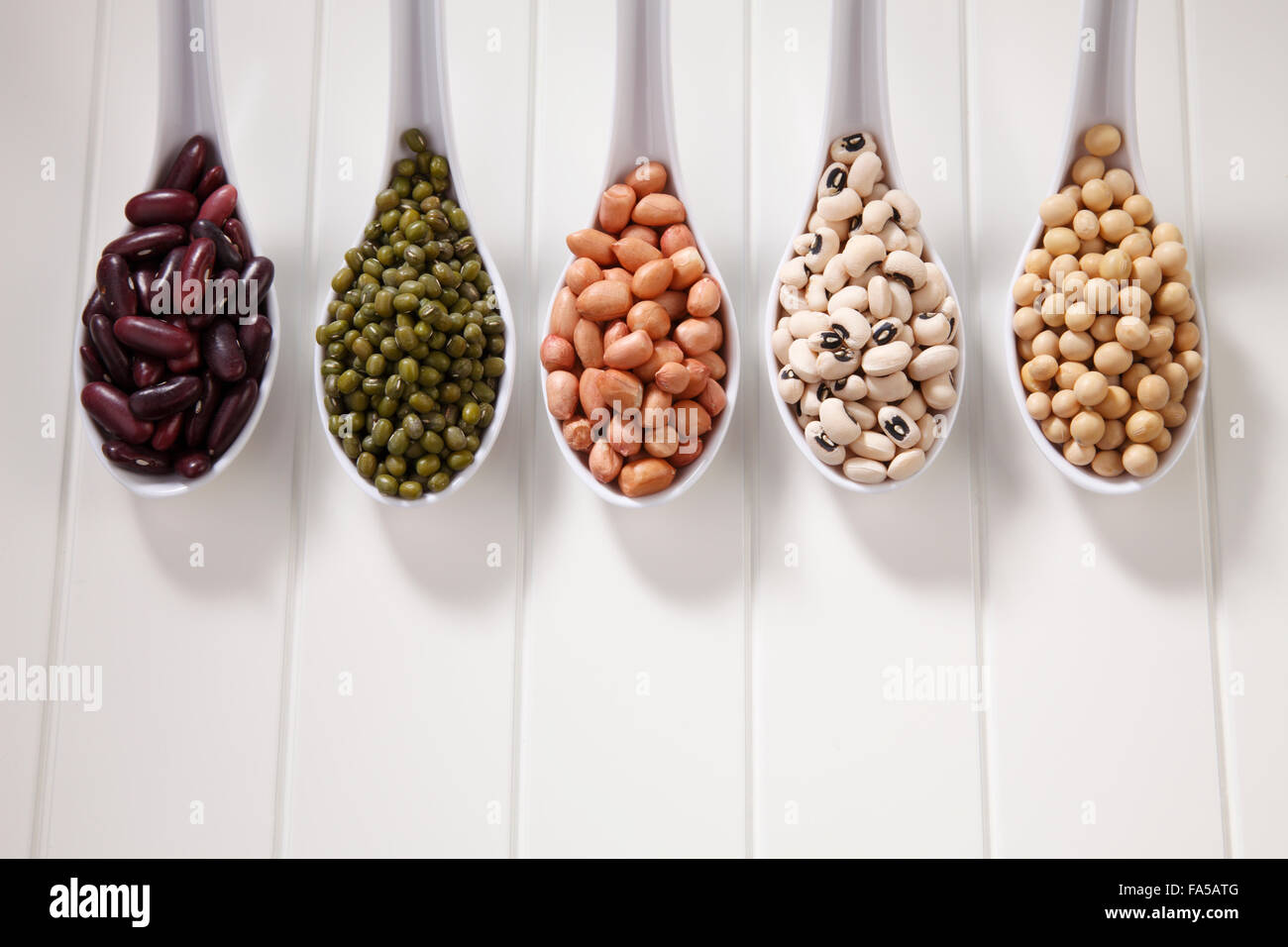 variety of beans group in five spoons Stock Photo - Alamy