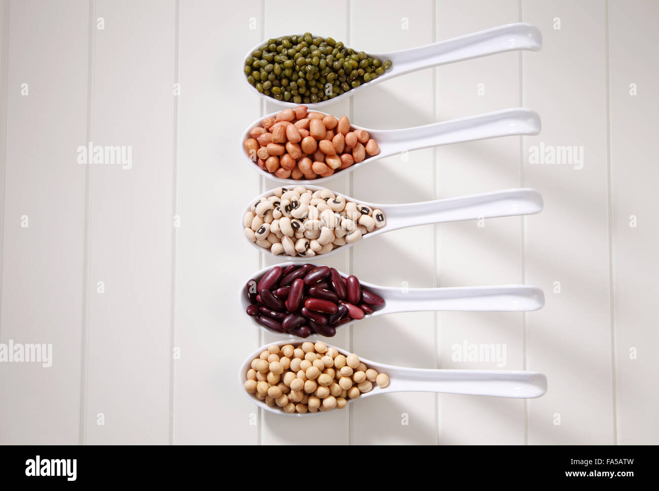 variety of beans group in five spoons Stock Photo - Alamy
