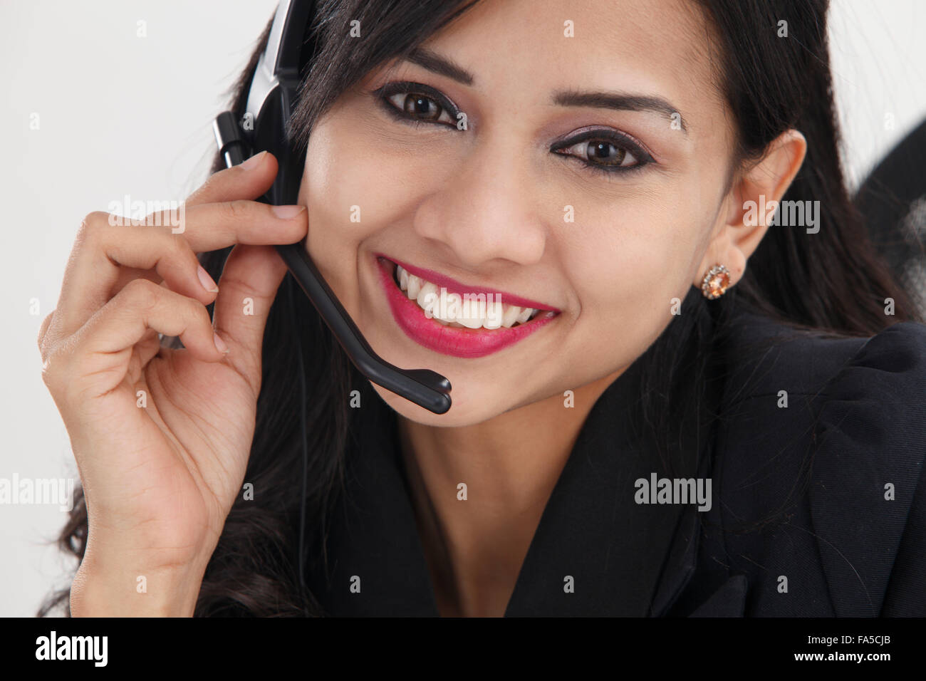 close up of the receptionist smiling,talking Stock Photo - Alamy