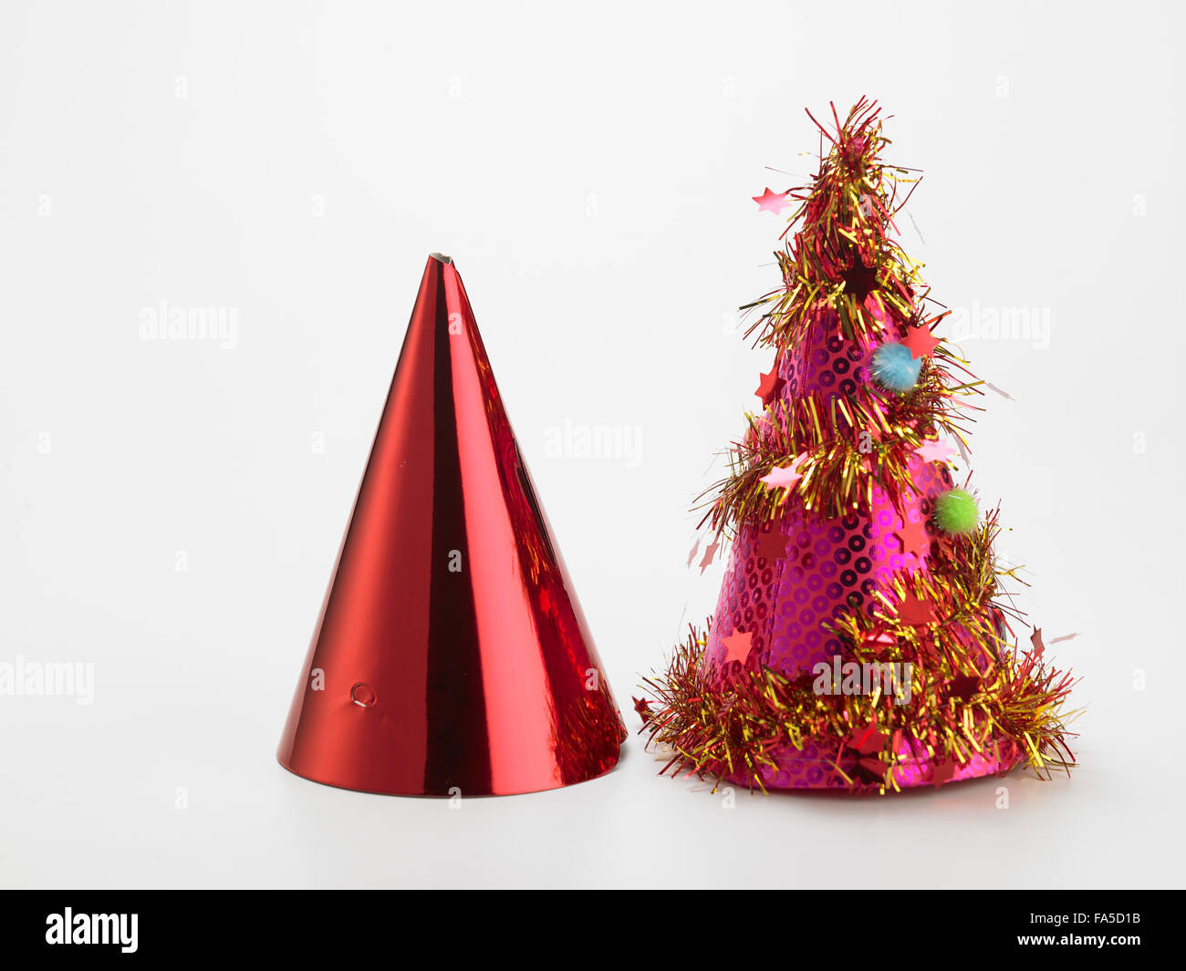 color party hat on the background Stock Photo - Alamy