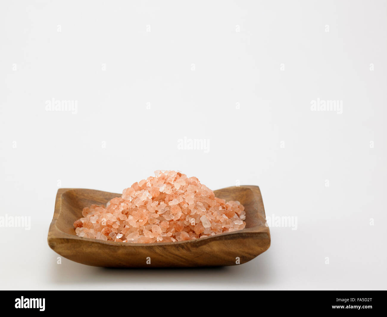 himalayan pink salt in the container Stock Photo - Alamy