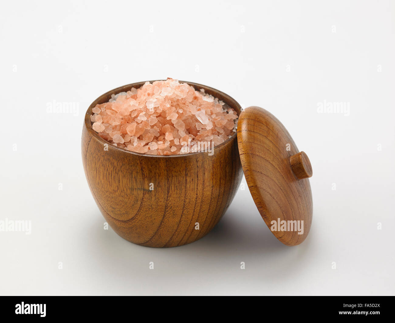 himalayan pink salt in the container Stock Photo - Alamy