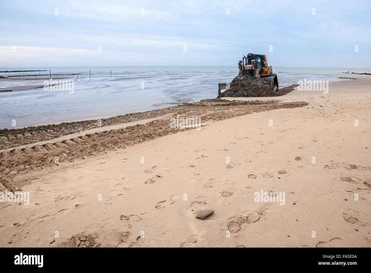 bulldozer on the beach sand on the move Stock Photo - Alamy