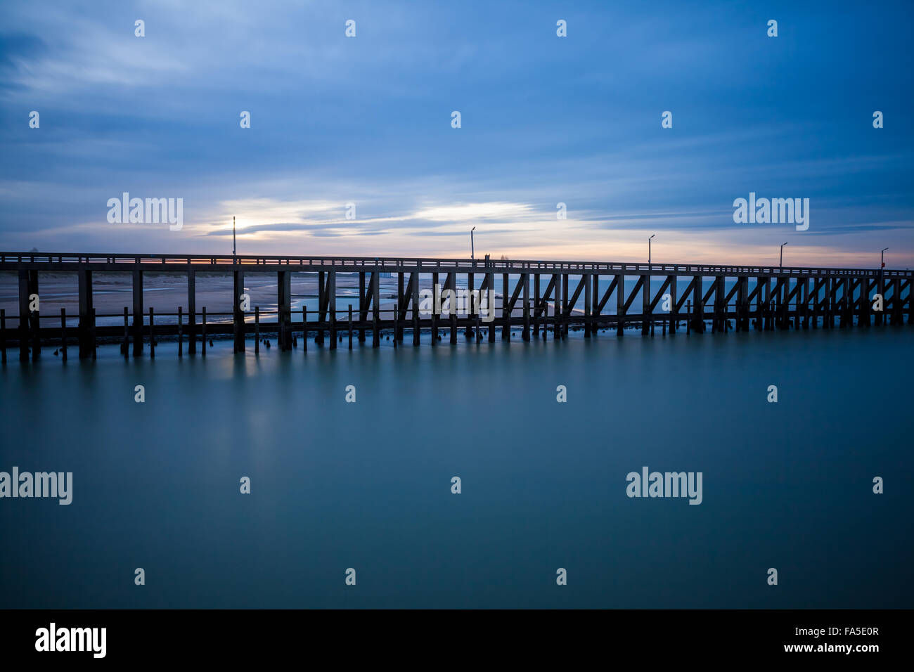 The pier that reaches deep into the sea Stock Photo - Alamy