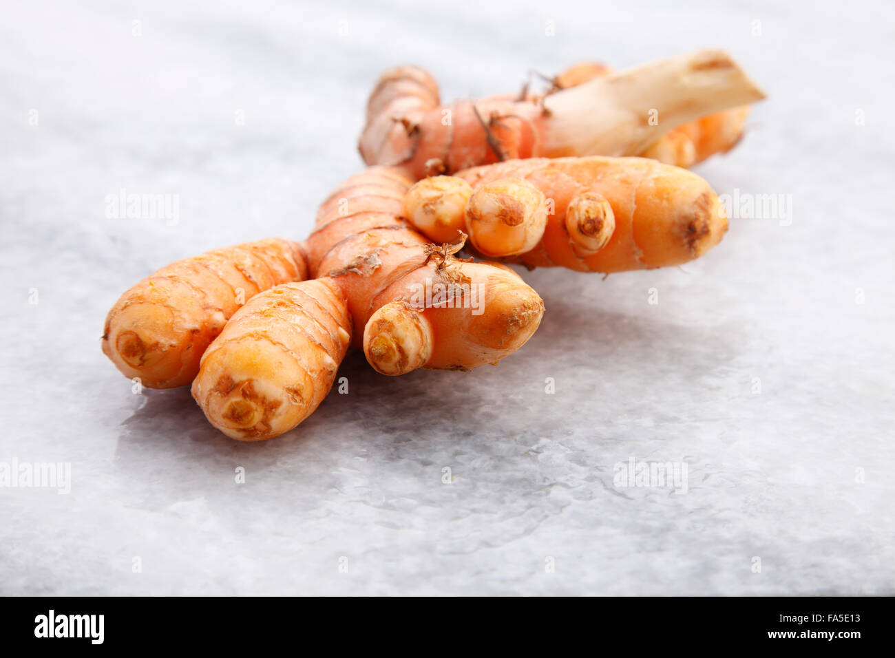 Turmeric isolated in white background Stock Photo - Alamy