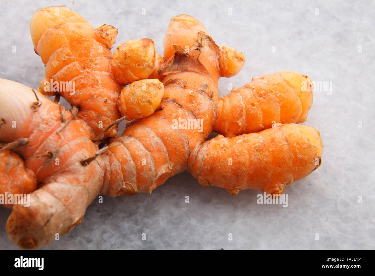 Turmeric isolated in white background Stock Photo - Alamy