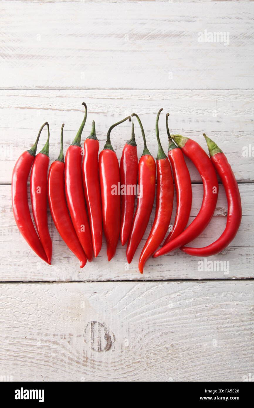 red chilli arrange in a line Stock Photo - Alamy