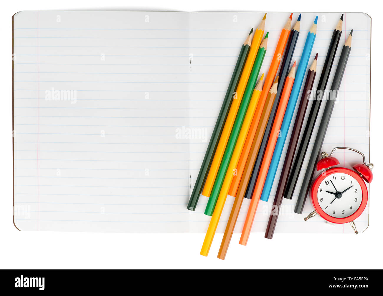Open notebook with set of crayons Stock Photo - Alamy