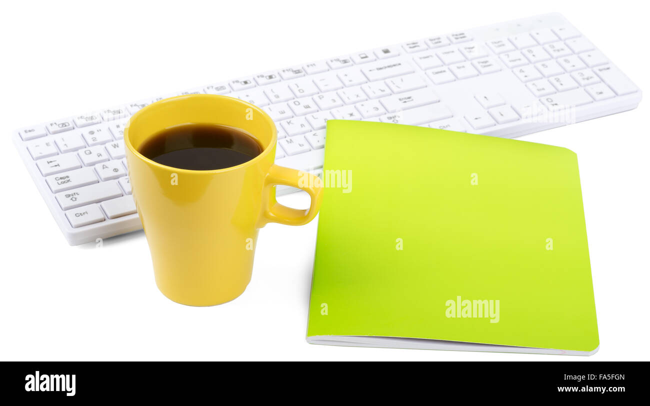 Keyboard with coffee and notebook Stock Photo - Alamy