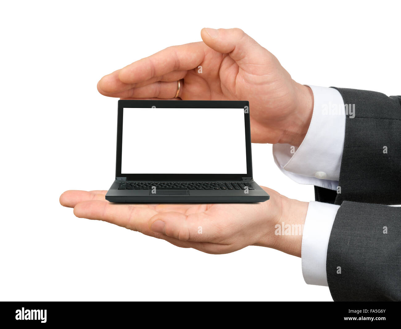 Male hands holding laptop Stock Photo - Alamy