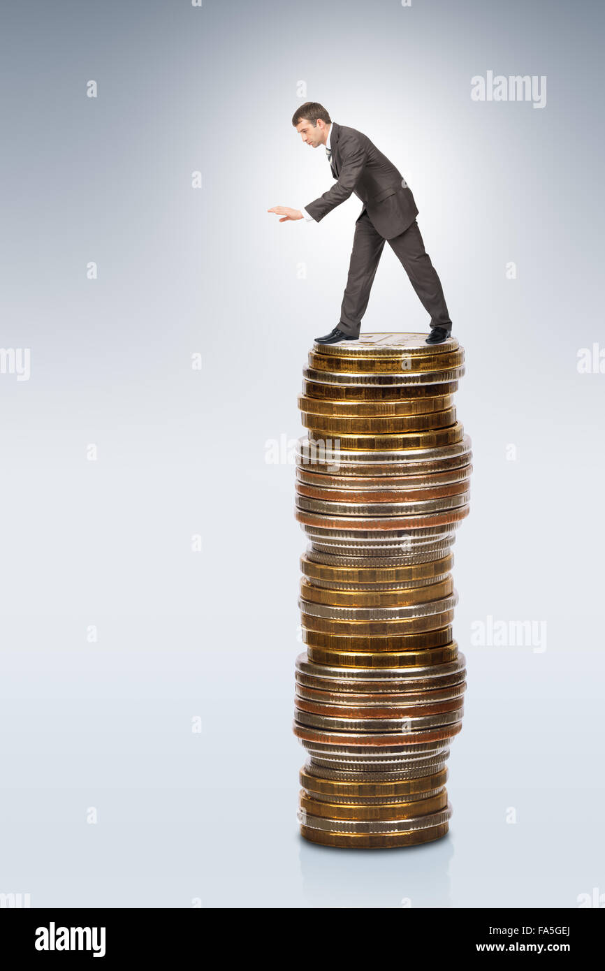 Bending coins hi-res stock photography and images - Alamy