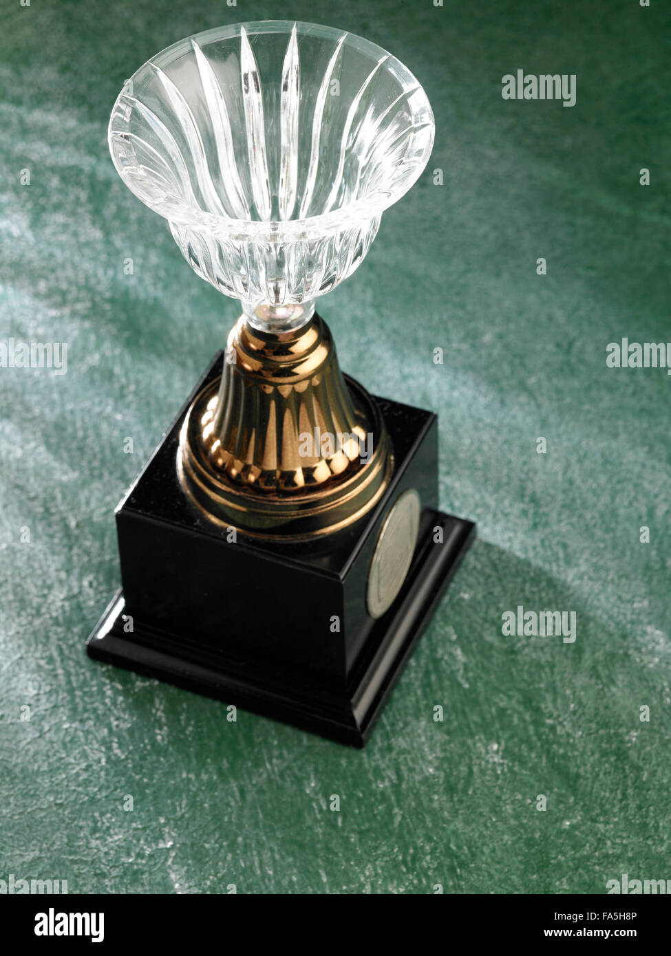 high angle shot of the trophy on the green background Stock Photo - Alamy