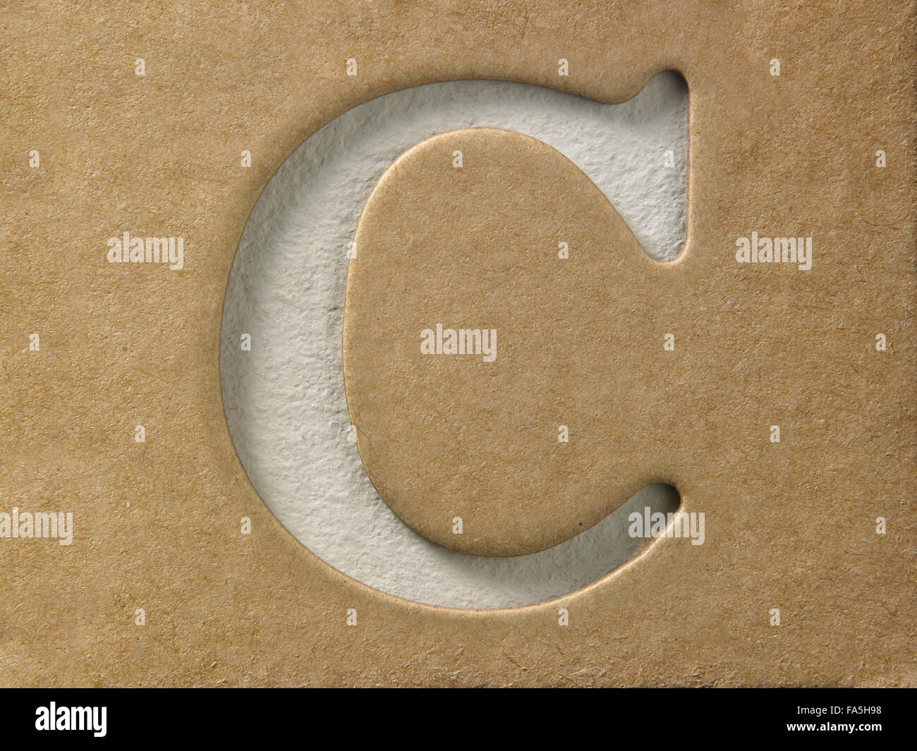 cut out alphabet c on the brown cardboard Stock Photo - Alamy