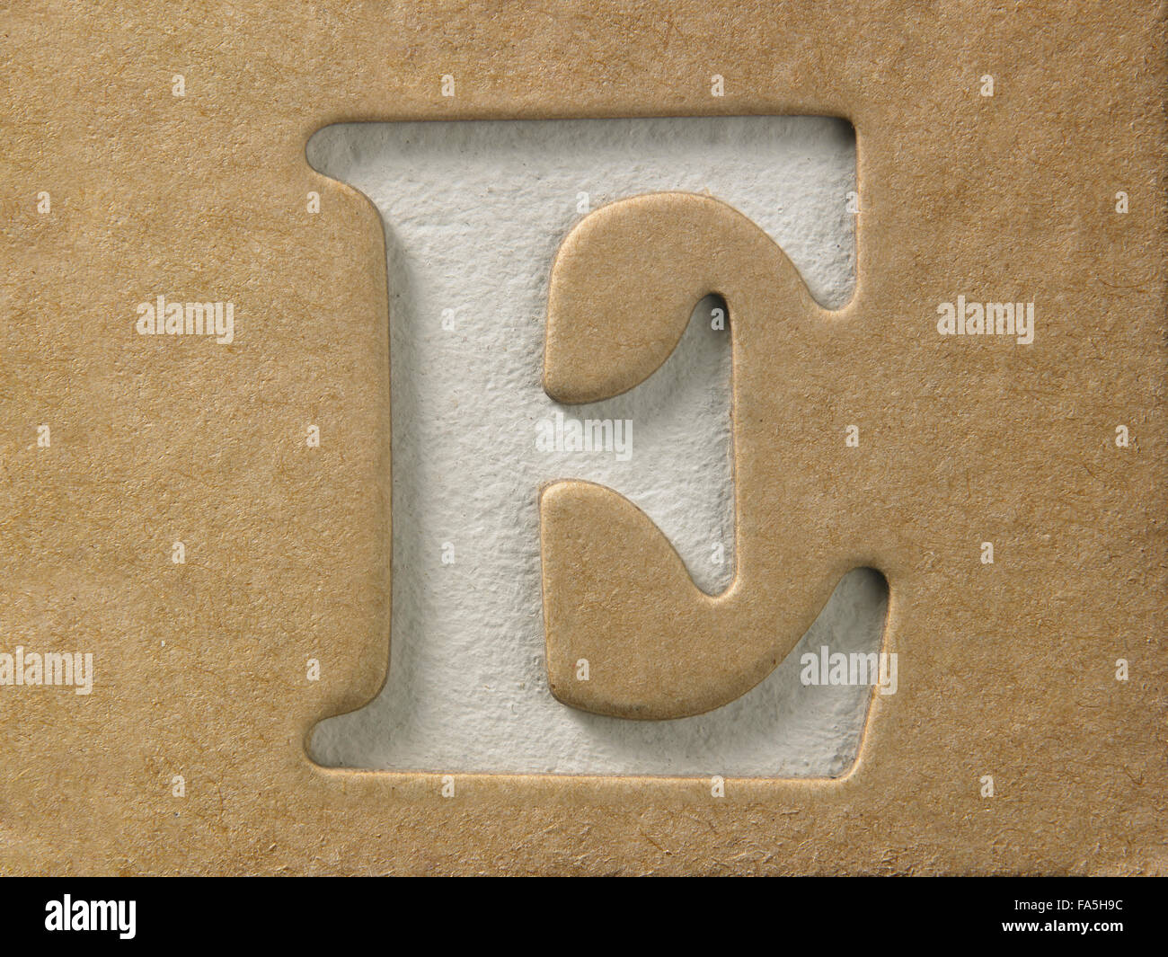 cut out alphabet e on the brown cardboard Stock Photo - Alamy