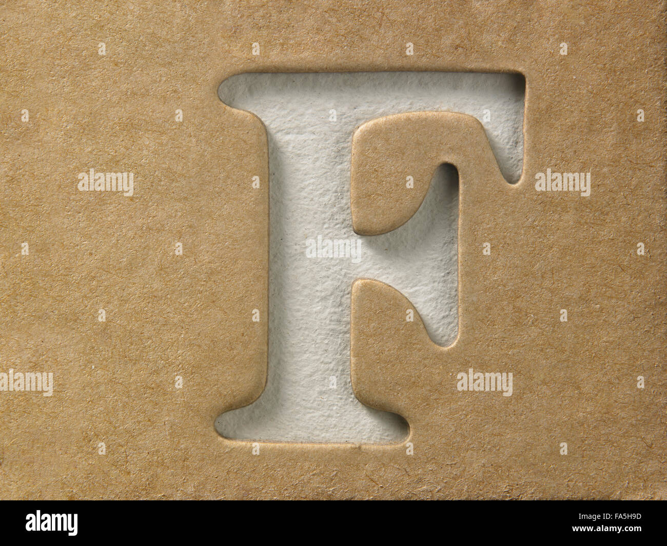 cut out alphabet f on the brown cardboard Stock Photo - Alamy