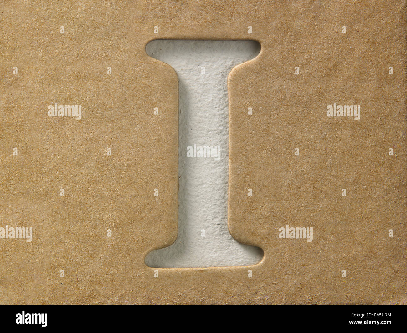 cut out alphabet i on the brown cardboard Stock Photo - Alamy