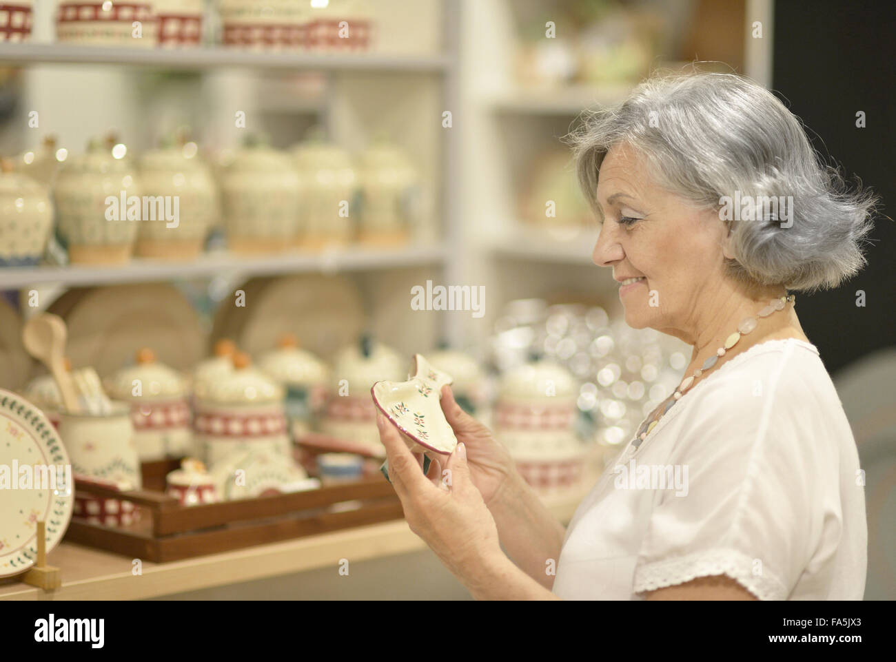 senior woman at souvenir store Stock Photo - Alamy