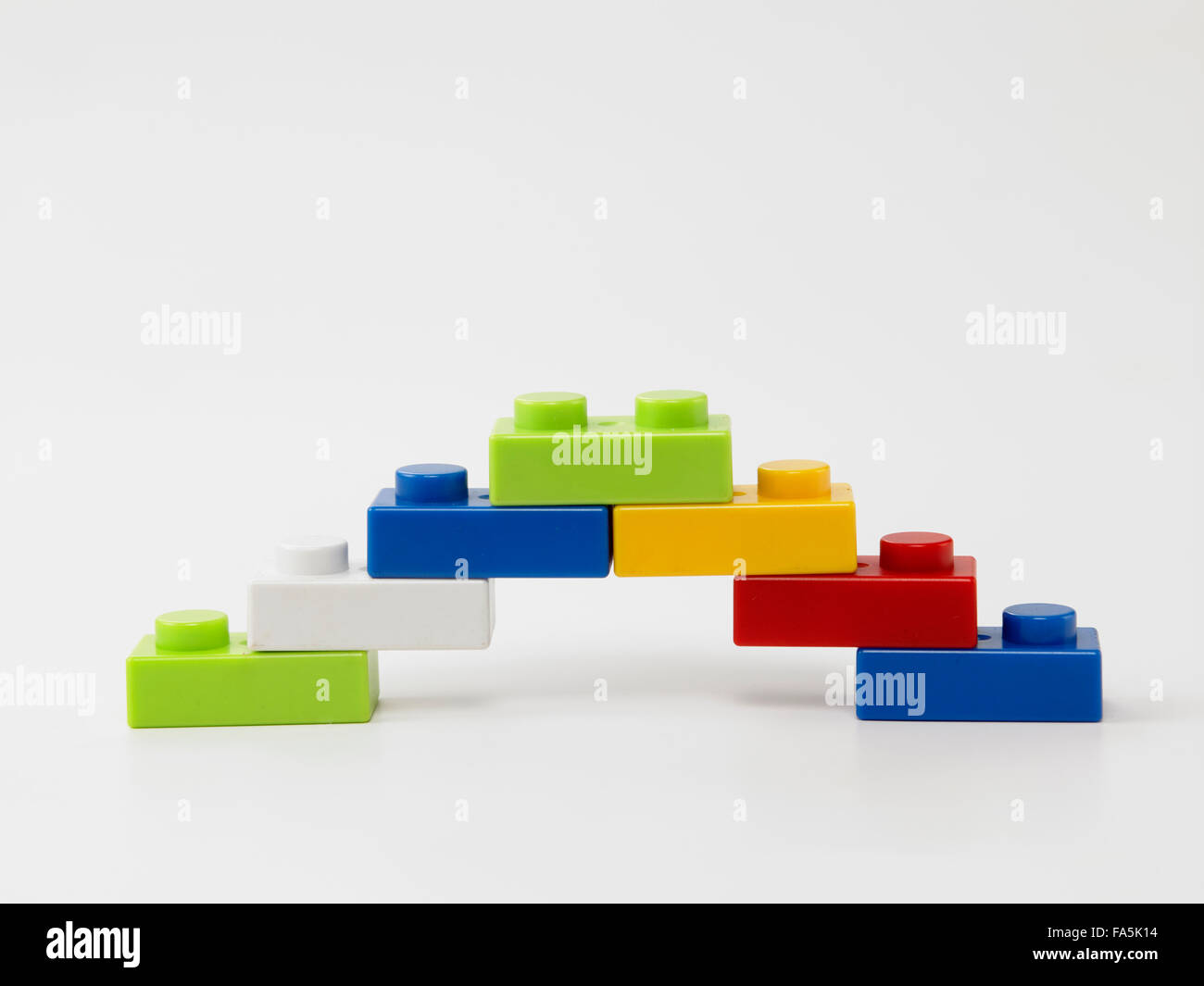 lego pieces stack up the white background Stock Photo - Alamy