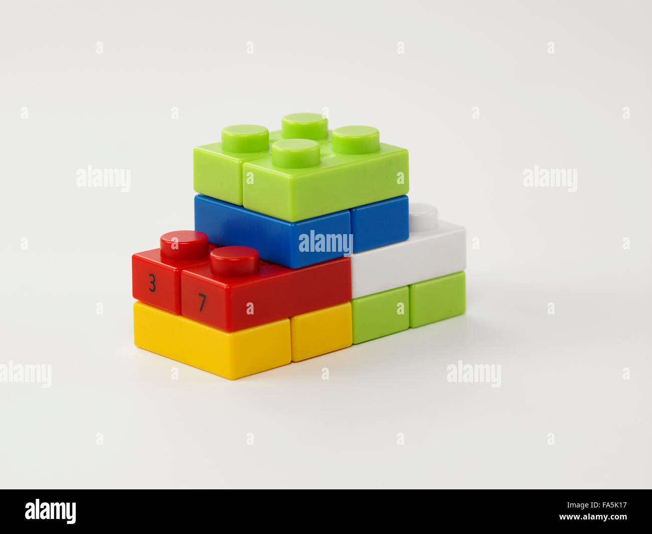 lego pieces stack up on the white background Stock Photo - Alamy