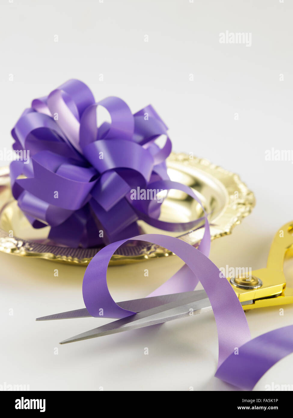 cutting purple ribbon -open ceremony concept Stock Photo - Alamy