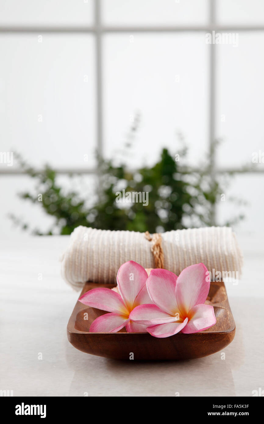 spa concept flower and the hand towel in a bath room Stock Photo - Alamy