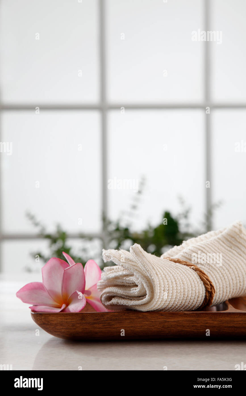 spa concept flower and the hand towel in a bath room Stock Photo - Alamy