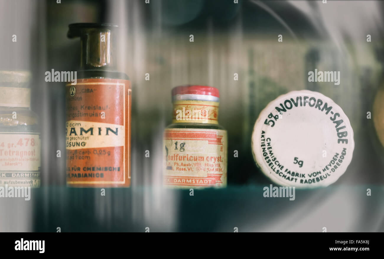vintage medications in small bottles on a shelf Stock Photo - Alamy