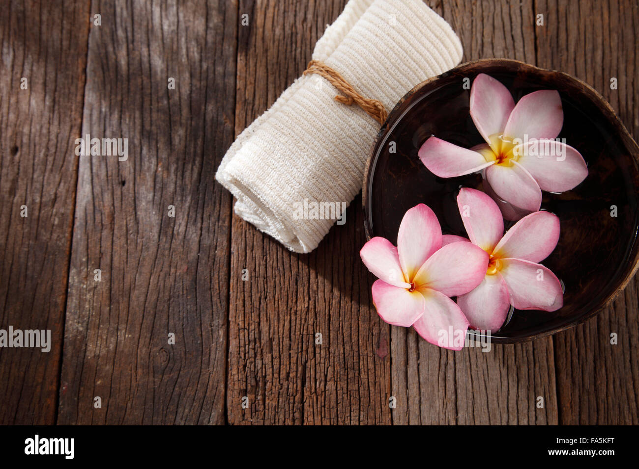 top view of frangipani flower ,hand towel and coconut shell Stock Photo ...
