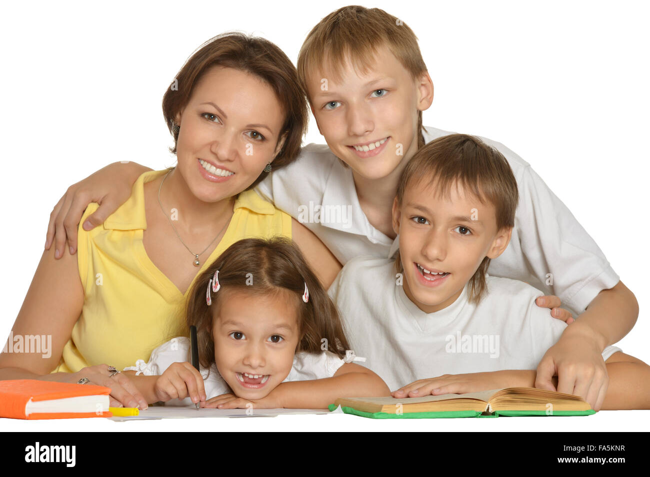 Mother help children do their homework Stock Photo - Alamy