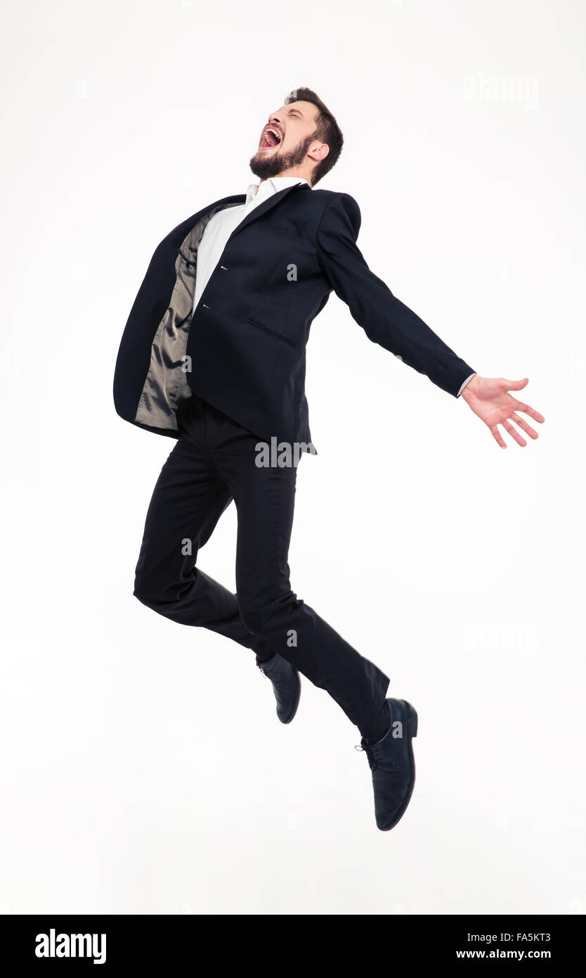 Excited elated happy young business man with beard in classic suit ...