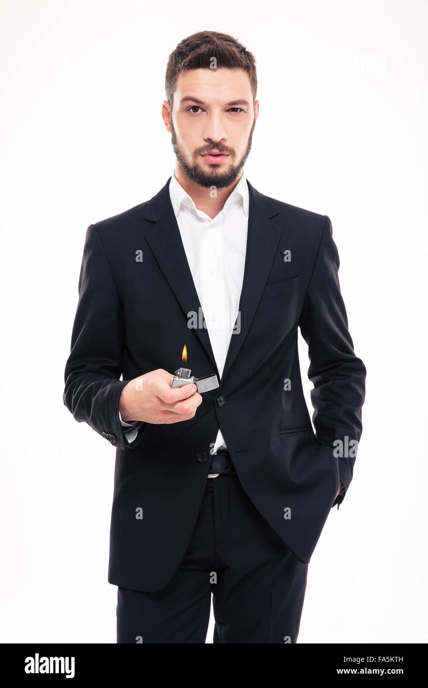 Confident bearded young business man in black suit and white shirt ...