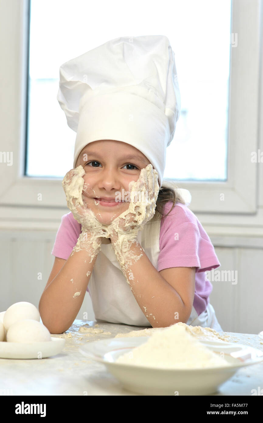 Little cooking in kitchen Stock Photo - Alamy