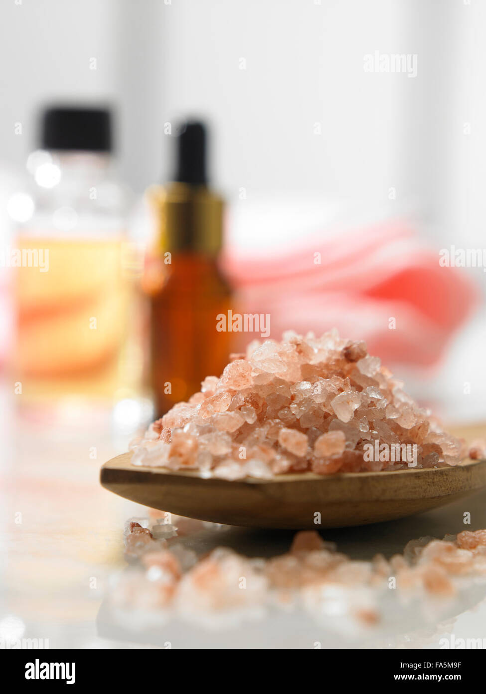 salt for body scrub and massage oil as background Stock Photo - Alamy