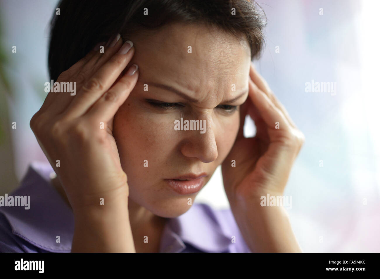 Sick woman with headach Stock Photo - Alamy
