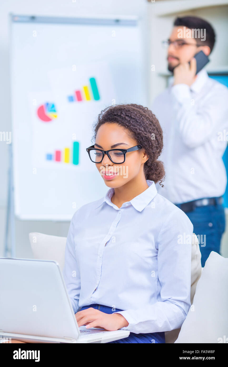 Two office workers in conference room Stock Photo - Alamy