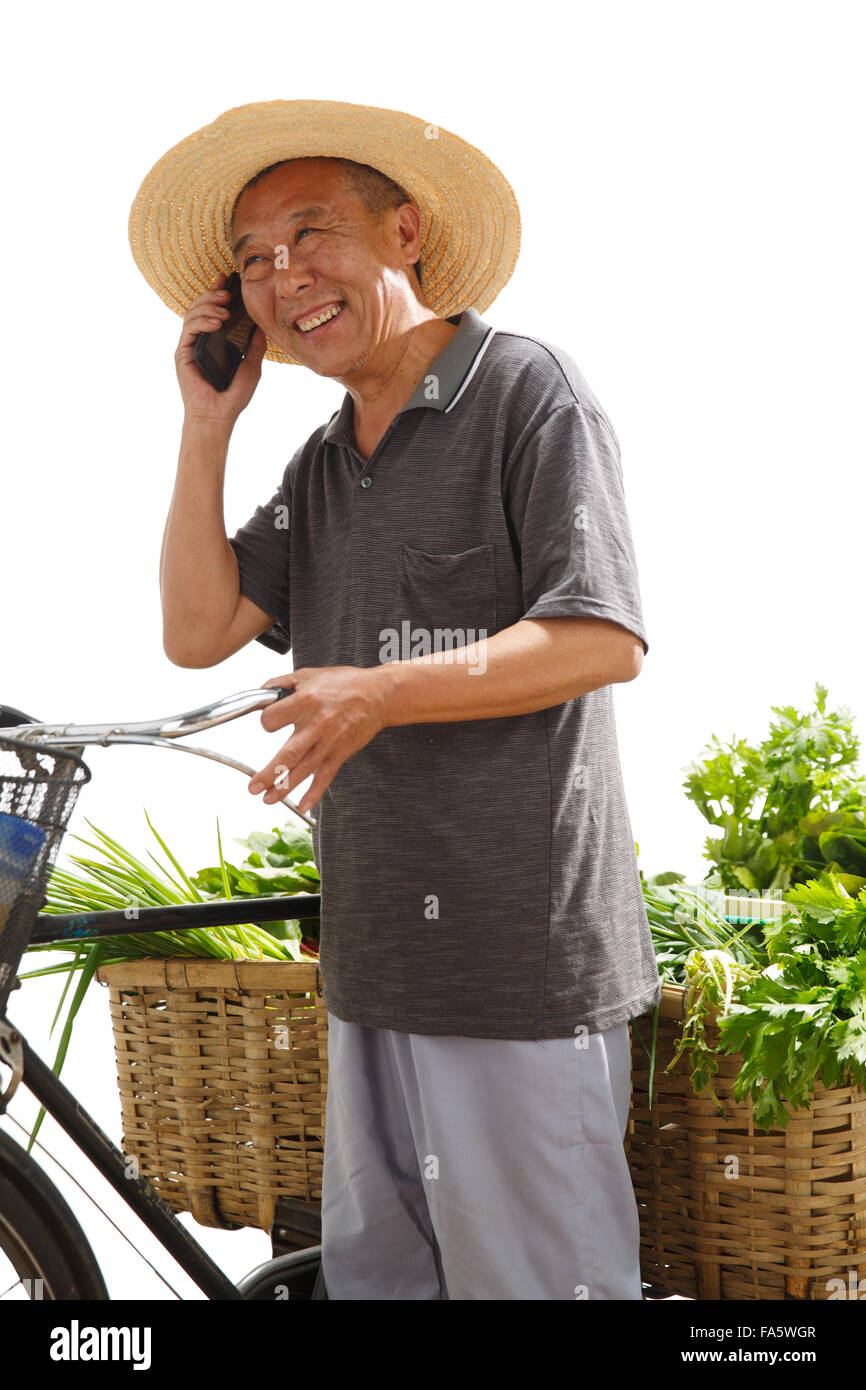 Farmers make a phone call Stock Photo - Alamy