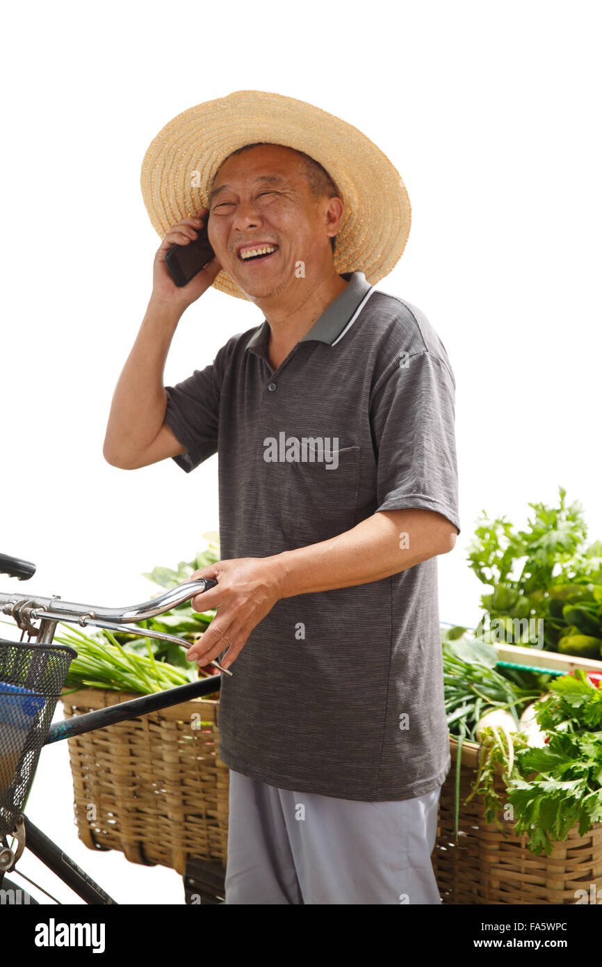 Farmers make a phone call Stock Photo - Alamy