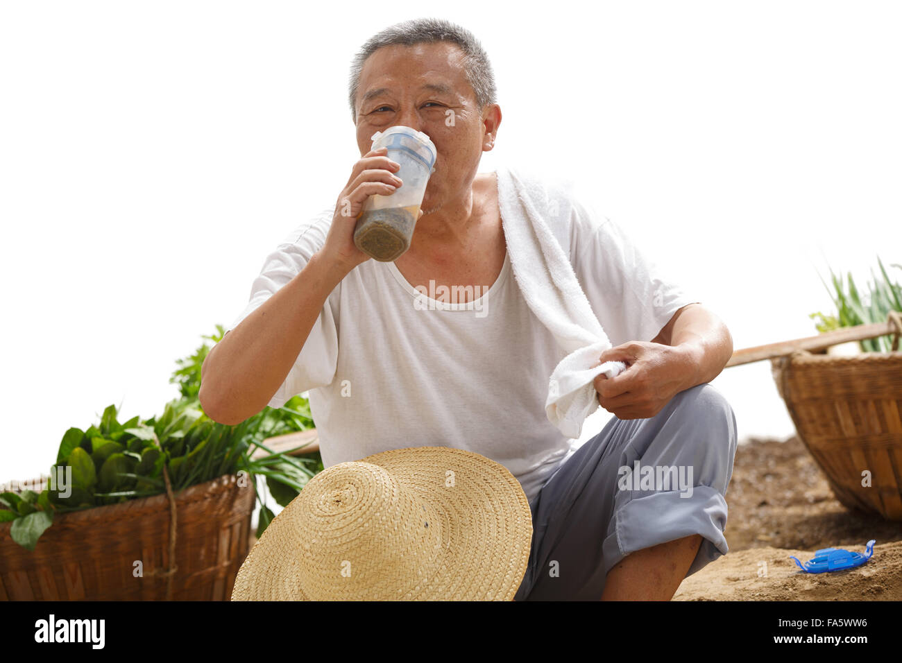 Farmers drink water Stock Photo - Alamy