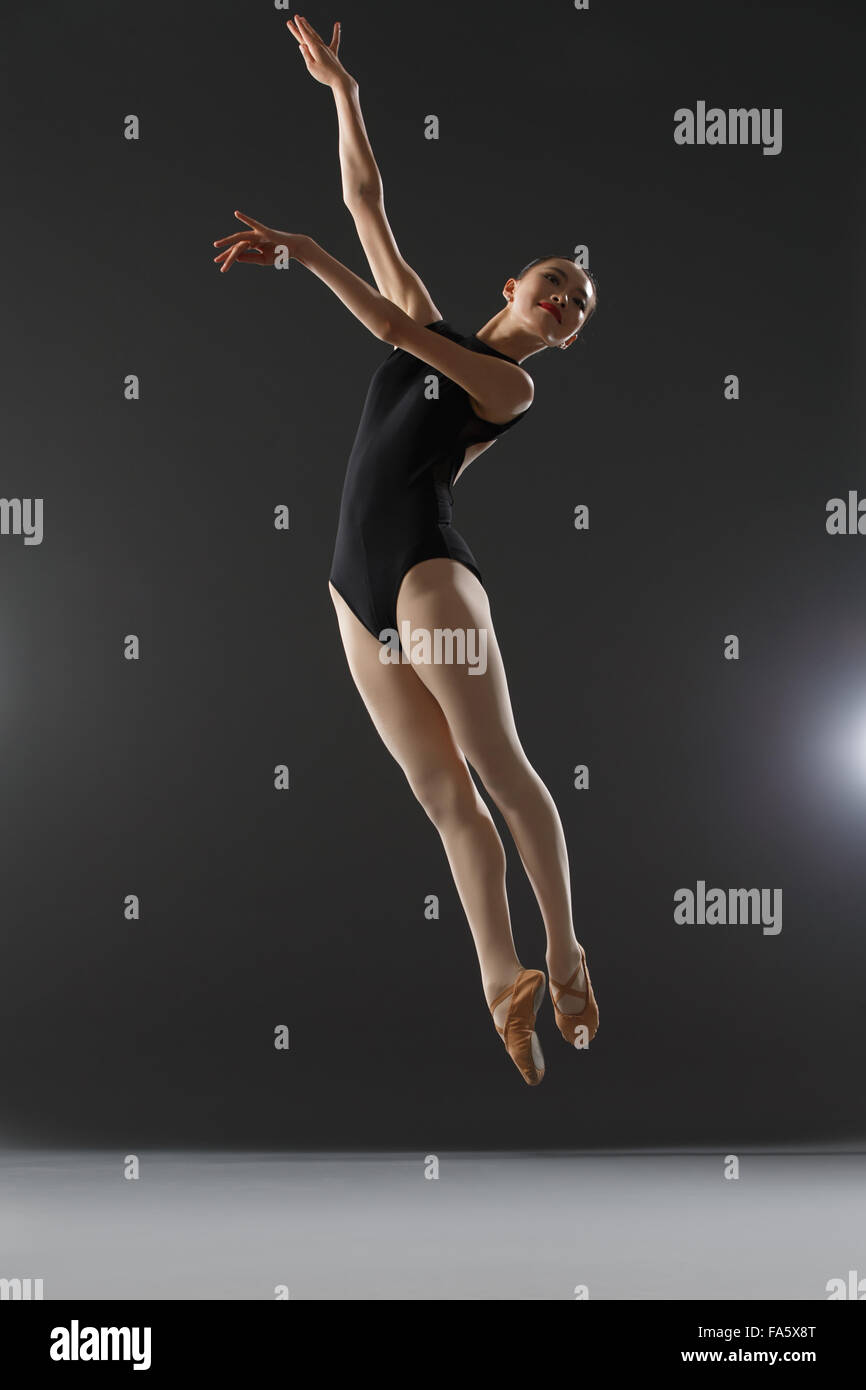 The young woman is dancing Stock Photo - Alamy