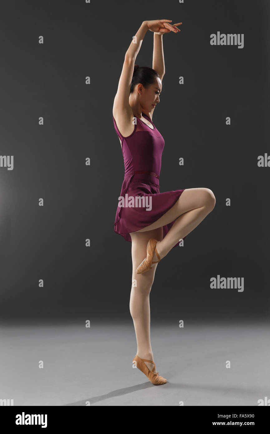 The young woman is dancing Stock Photo - Alamy