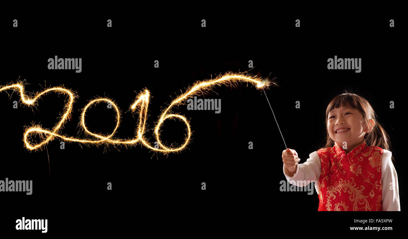 The little girl in the fireworks Stock Photo - Alamy