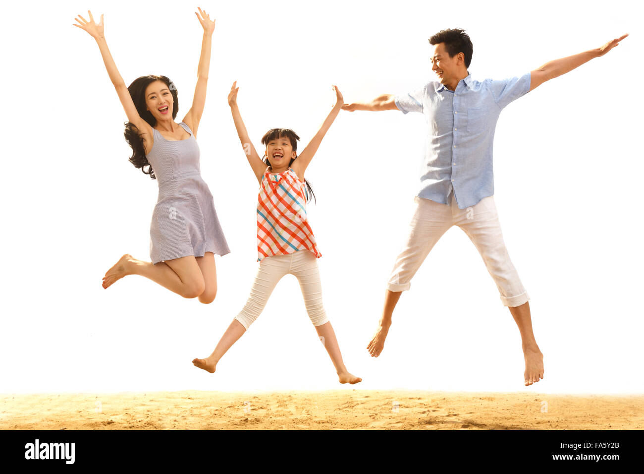 Family jumping hi-res stock photography and images - Alamy