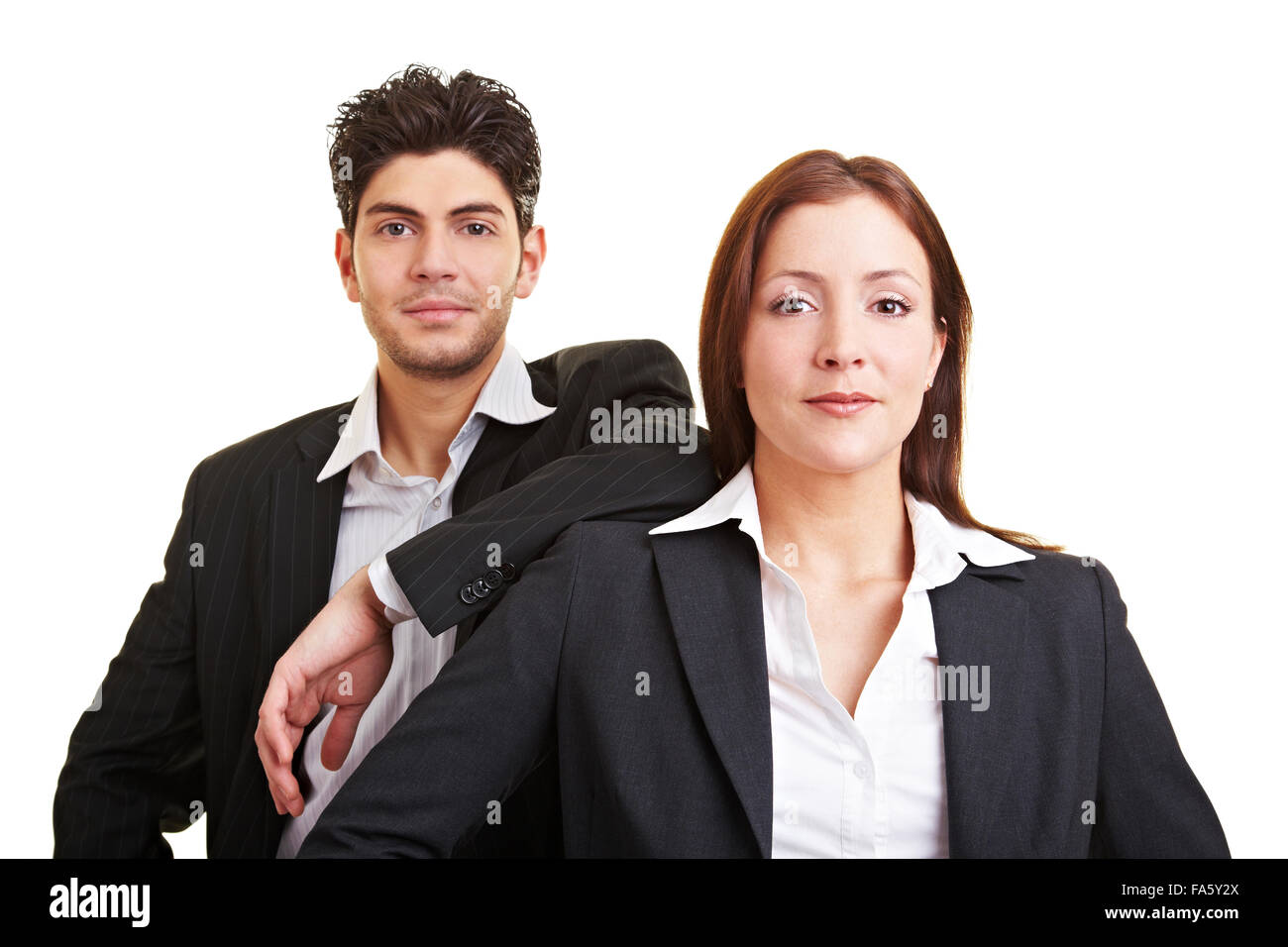 Two young content business people looking into the camera Stock Photo ...