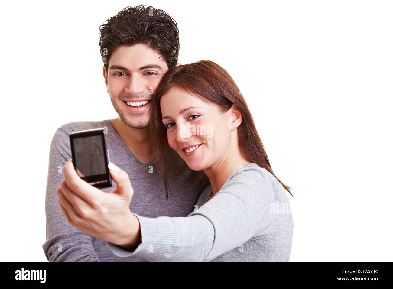 Happy smiling couple taking self portraits with a cell phone Stock ...