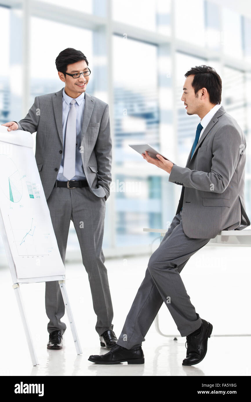 Business men exchange work Stock Photo - Alamy