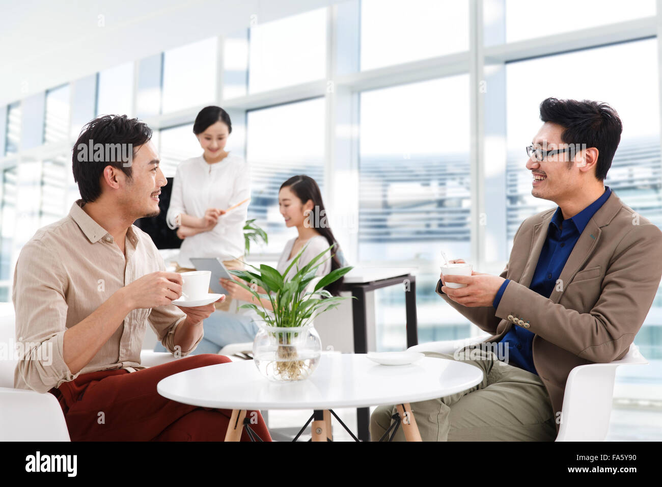 Business men talking Stock Photo - Alamy