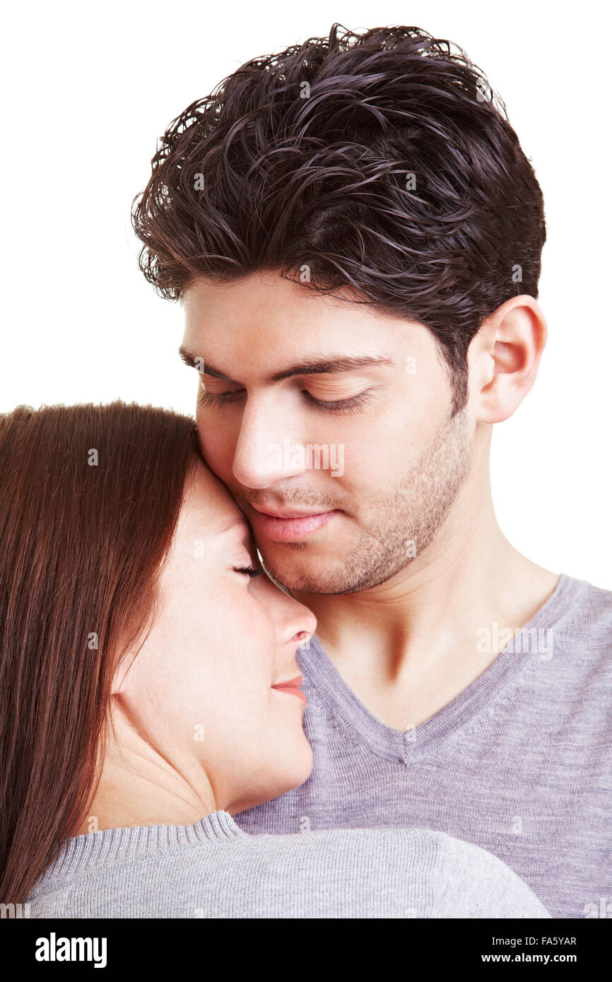 Happy young couple in love cuddling close Stock Photo - Alamy