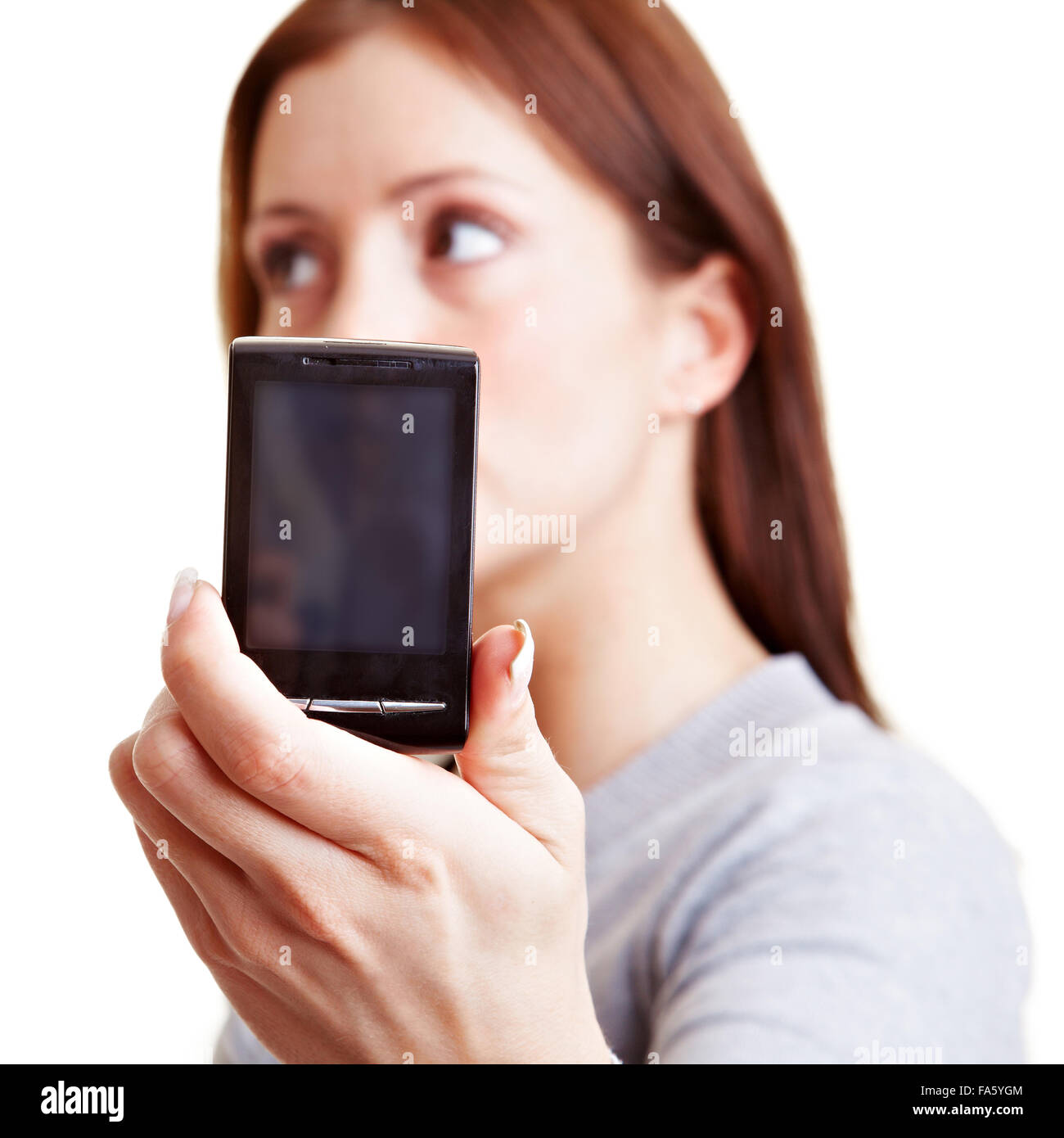 Young woman taking self portraits with her cell phone Stock Photo - Alamy