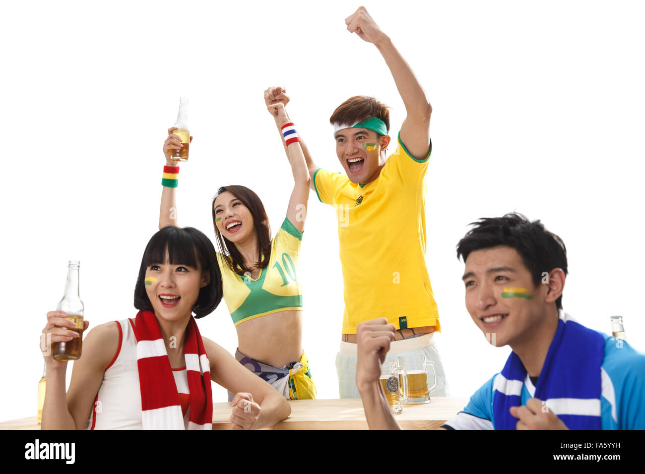 Young fans watching the game cheering Stock Photo - Alamy