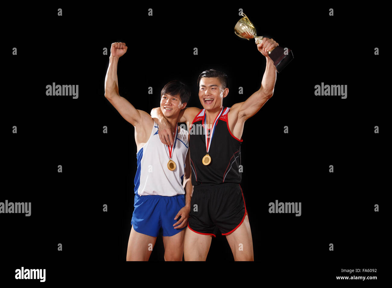 Athletes win medals and trophies Stock Photo - Alamy